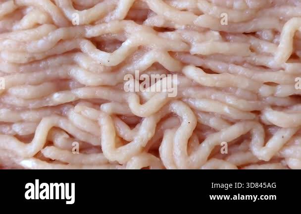 Raw ground chicken for burgers and other food. Raw minced chicken meat ...