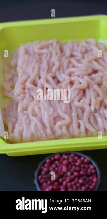 Raw ground chicken for burgers and other food. Raw minced chicken meat ...