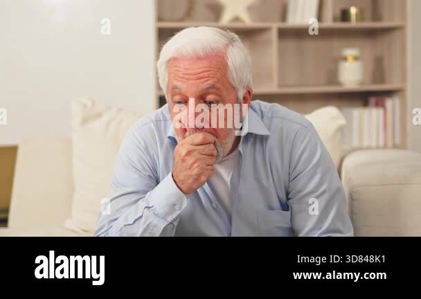 Healthcare medicine. Senior man with high fever symptoms illness cold ...