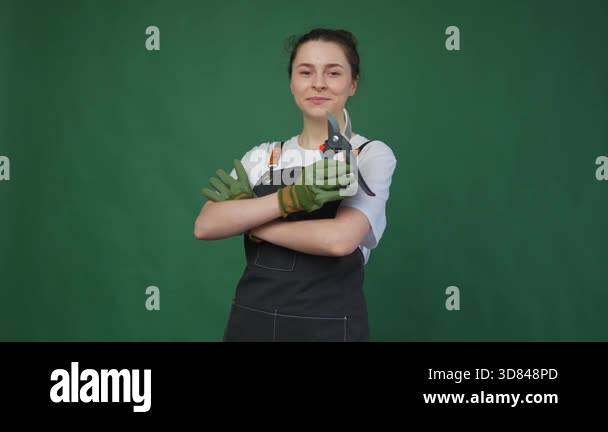 Running of own business. Woman florist gardener farm worker with pruner ...