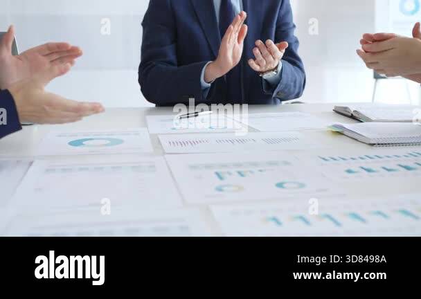 Businesspeople team clapping hands in meeting celebrating success with ...
