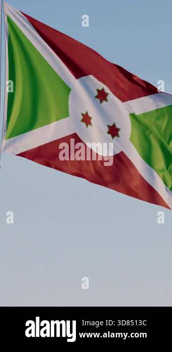 Burundi, Gitega: Cinematic Vertical Waving National Flag Against Blue ...
