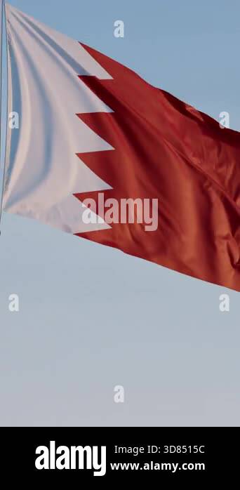 Bahrain, Manama: Cinematic Vertical Waving National Flag Against Blue ...