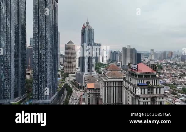 time lapse shot of a large, dense metropolitan city dominated by a mix ...