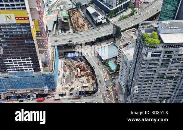 time lapse shot of a large, dense metropolitan city dominated by a mix ...