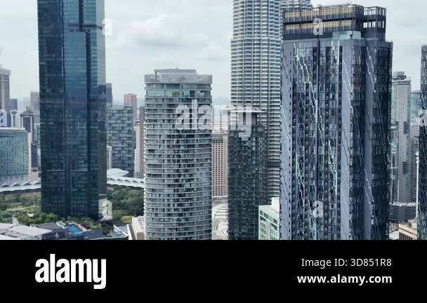 time lapse shot of a large, dense metropolitan city dominated by a mix ...