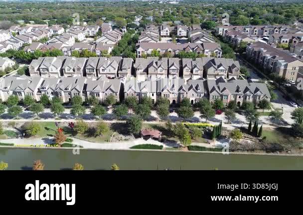 Canal-lined townhomes in Flower Mound Riverwalk, Denton County, Texas ...