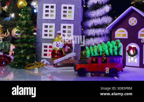 A yellow car drives up to the houses in a small town Stock Video ...