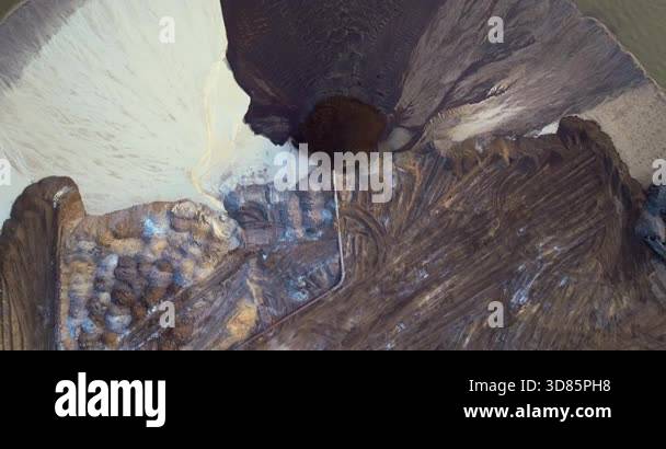 Aerial view of phosphate mining field with pipeline ejecting wet sand ...