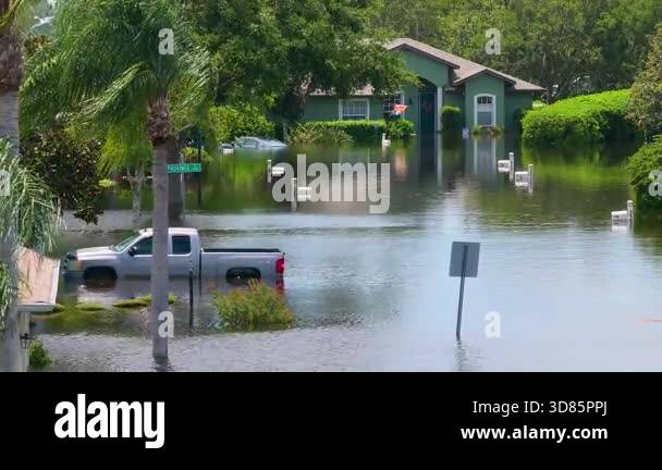 Hurricane Debby tropical rainstorm flooded cars and residential homes ...