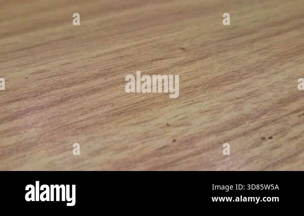 Forward side view closeup shows wood design on floor in motion ...