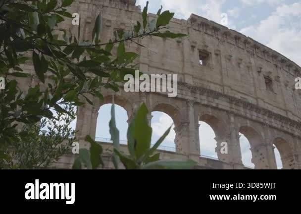 Daytime full view of the Colosseum in Rome showcasing its ancient ...
