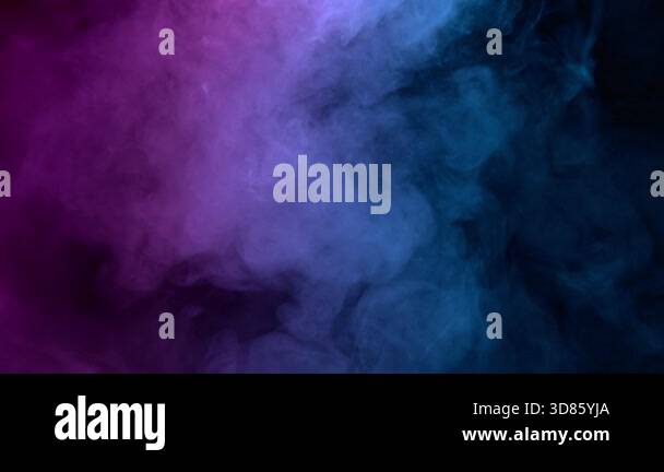 Super Slow Motion Shot of Atmospheric Smoke in Neon Colors Slowly ...