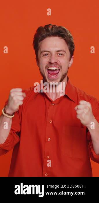 Happy joyful Caucasian man celebrating success victory, winning ...