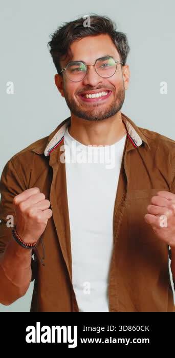 Happy joyful Indian man celebrating success victory, winning birthday ...