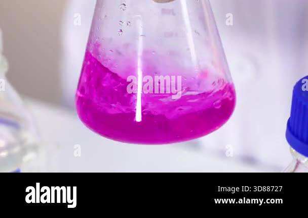 Chemical reaction observed in a laboratory setting Stock Video Footage ...