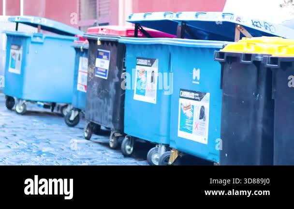 Colorful bins in a Melbourne alleyway Stock Video Footage - Alamy