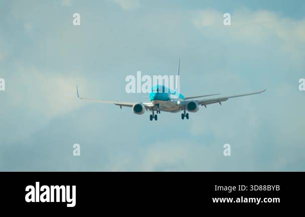 Airliner battling strong crosswind while flying in cloudy sky ...