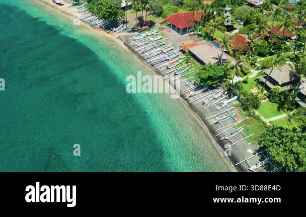 High-quality aerial of Amed Beach and Bunutan Boat Pier with vibrant ...