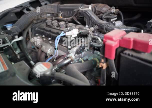 Opening Car Hood Showing Engine Bay Details and Vehicle Maintenance ...