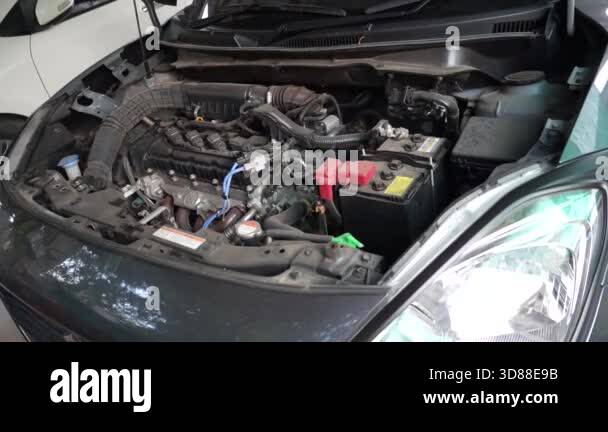 Opening Car Hood Showing Engine Bay Details and Vehicle Maintenance ...