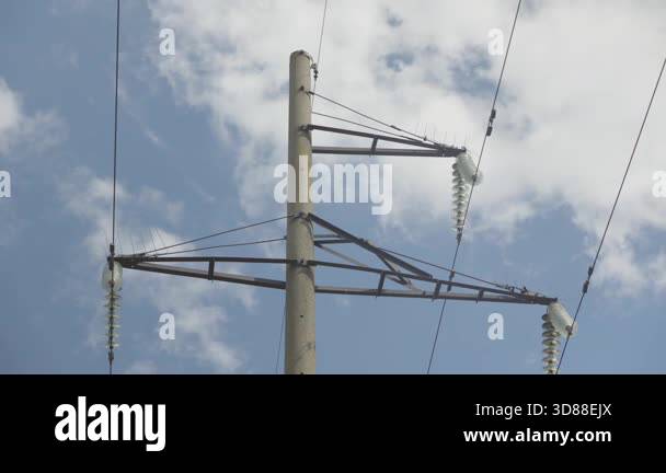 Power pole supporting electrical wires Stock Video Footage - Alamy