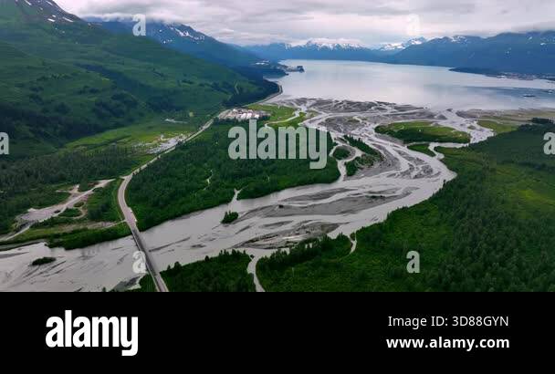 Branching river flows into a vast waterscape. Beautiful scenery of wild ...