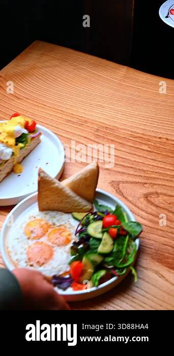 Warm breakfast with toast. A warm breakfast plate with eggs, toast and ...