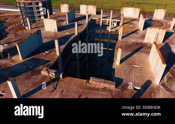 Flight over the carcass of the multi-storied building construction ...