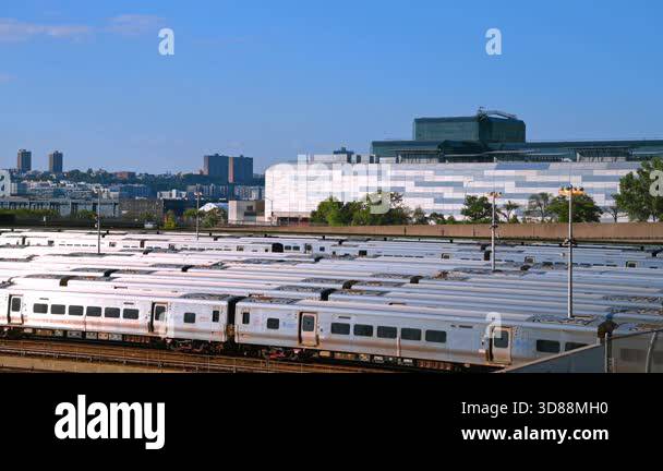 Rail yard beside Hudson Yards complex. Rows of commuter trains line the ...