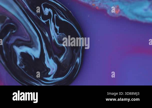 Fluid spill. Paint background. Defocused blue purple color flow ...
