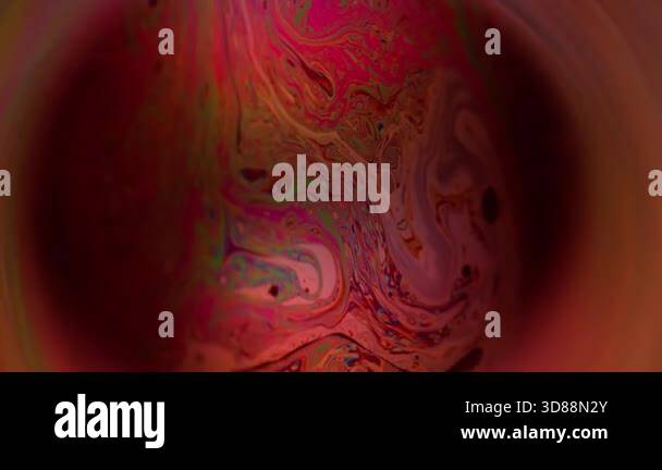 Blur ink spectrum. Liquid planet sphere. Red pink globe colorful light halo. Abstract bright oil ...