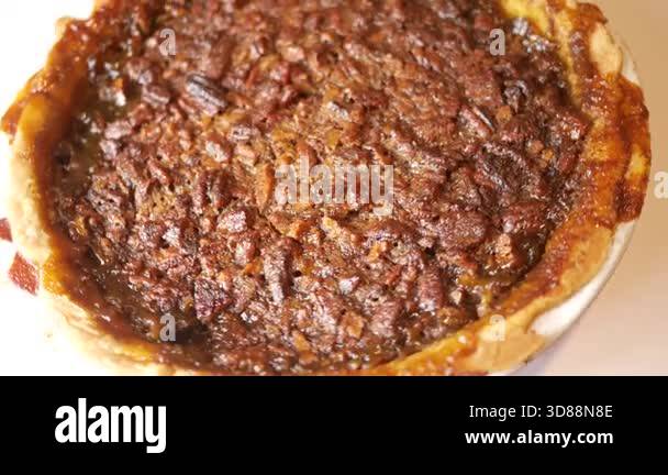 A Butter Pecan Pie for Thanksgiving Spinning over Whit Stock Video ...