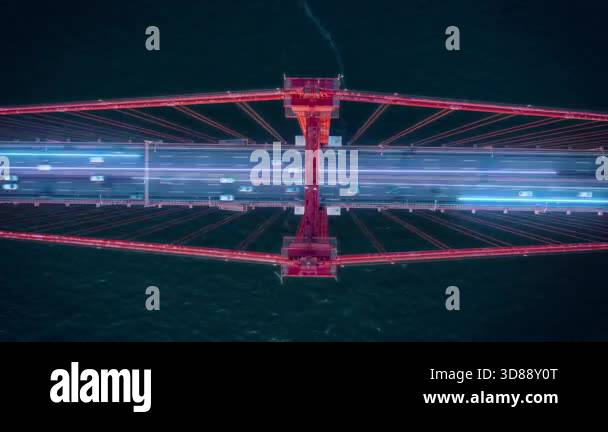 Futuristic aerial view of traffic crossing a bridge. Glowing digital ...
