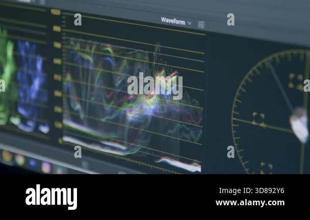 Color grading process unfolds on a computer screen, featuring waveform ...
