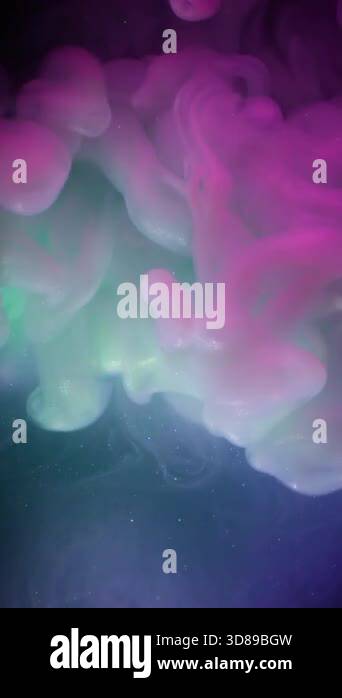 Vertical video. Cloud splash. Neon ink. Purple green fume puff ...