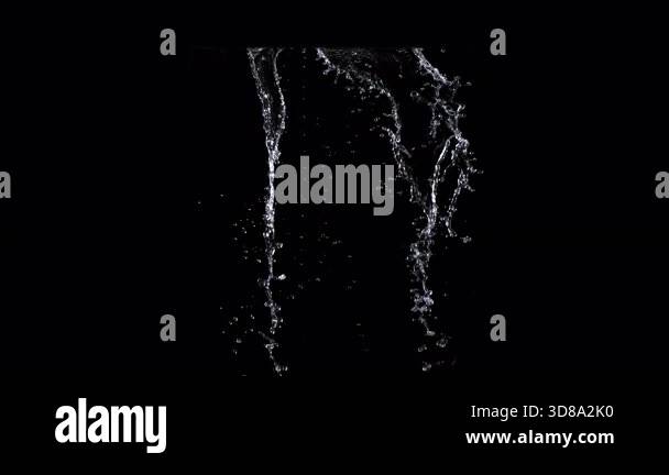Super Slow Motion Shot of Dripping Water Isolated on Black Background ...