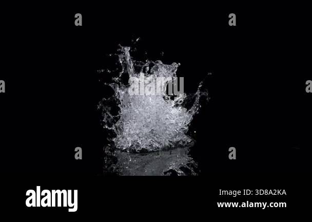 Super Slow Motion Shot of Real Water Splash from Surface Isolated on ...