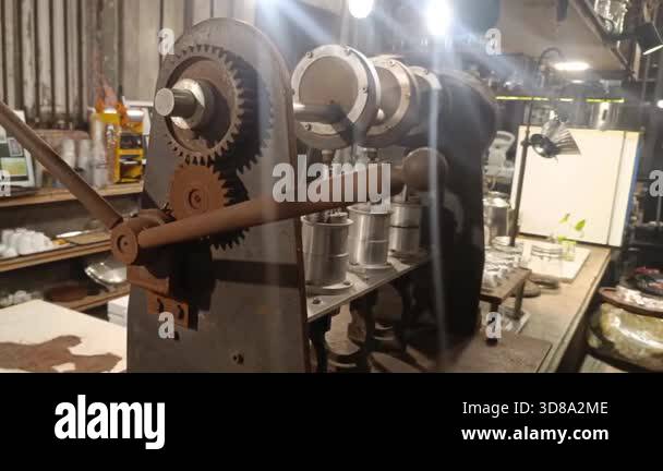 An industrial-era machine stands as a monument to inventive engineering ...
