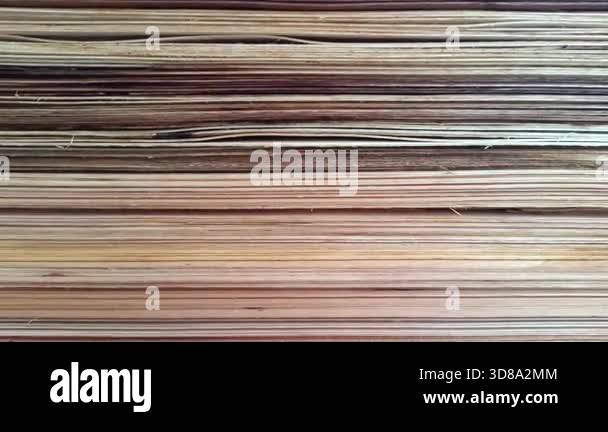 Close up view of a stack of plywood, revealing the detailed layers of ...