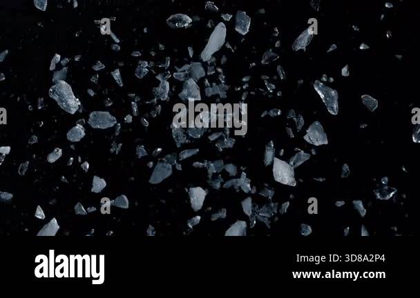 Super Slow Motion Shot of Real Ice Pieces Flying Towards Camera ...