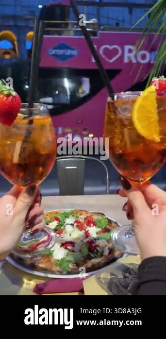 I Love Rome tourist bus clink glasses of Aperol Glass with Aperol ...