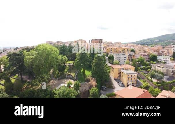 Aerial view shows a vibrant hillside community with various residential ...