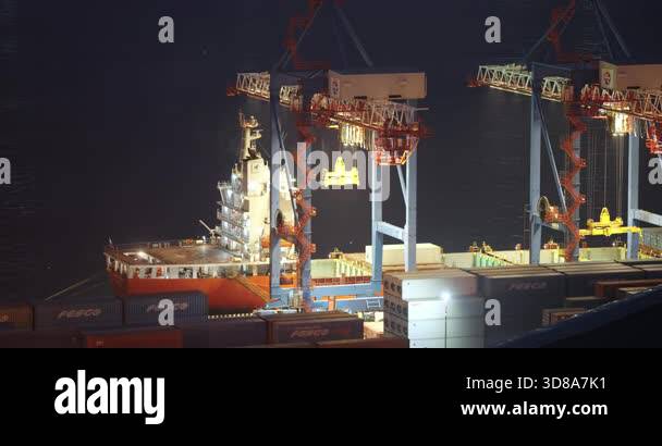 ALMATY, KAZAKHSTAN - OCTOBER 09 2025: Night port alive with cranes ...