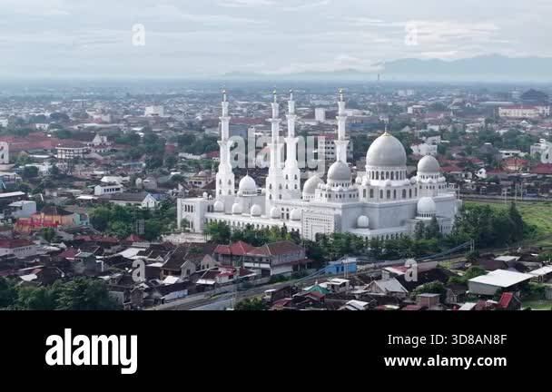 Morning aerial view of the Sheikh Zayed Grand Mosque surrounded by the ...