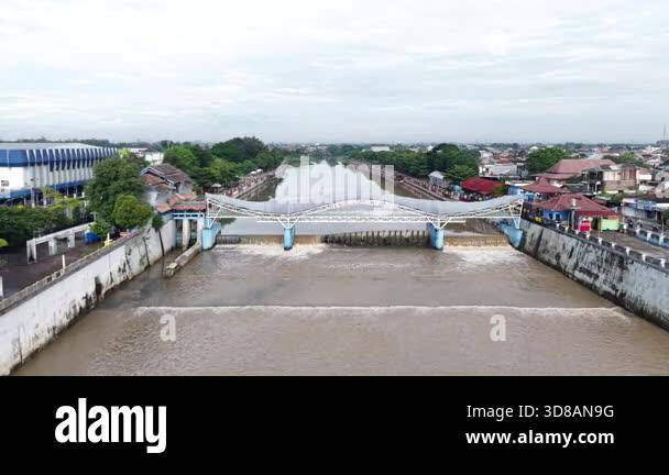 Aerial footage of the Tirtonadi Rubber Dam in Solo, Central Java ...