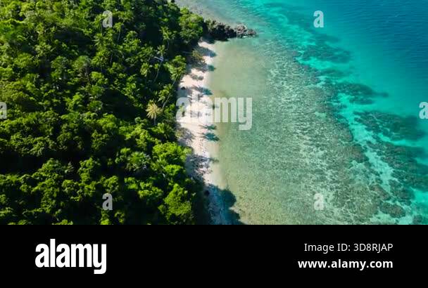 Beach with coconut trees and white sand with sun reflection. Bang-og ...