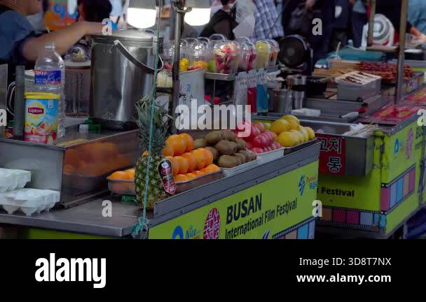 BUSAN, SOUTH KOREA - OCTOBER 10, 2025 - Street food vendor offering ...