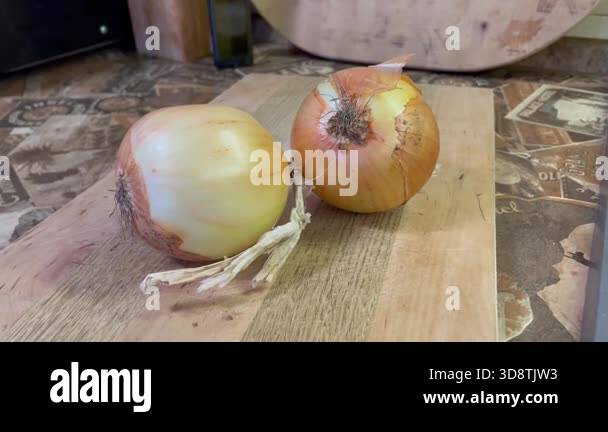 onions, vegetables, onion on wooden board Stock Video Footage - Alamy