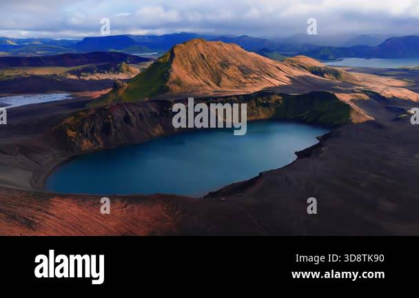 Aerial camera glides above Ljotipollur crater near Landmannalaugar ...